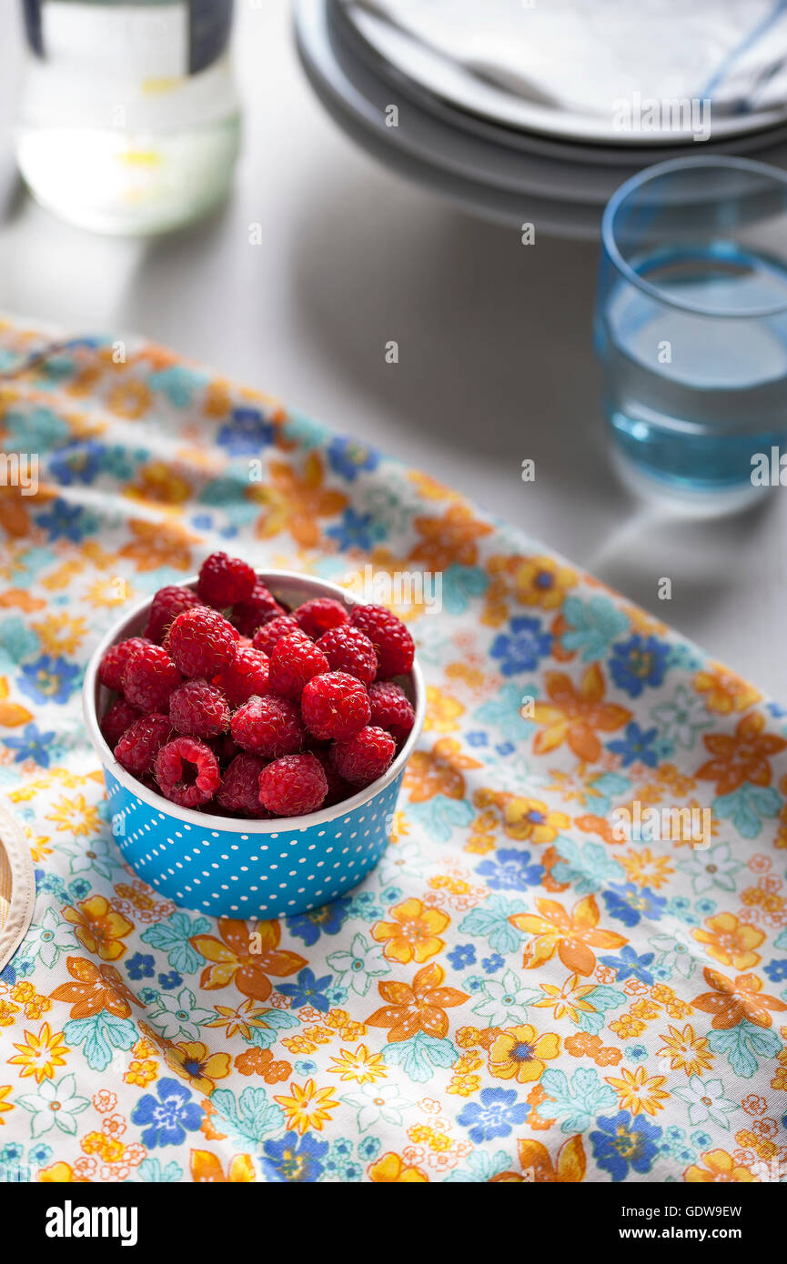 Raspberry on a kitchen table Stock Photo - Alamy