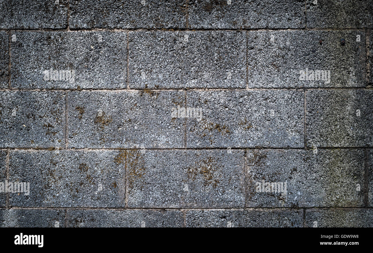 Grey breeze block grungy wall background Stock Photo - Alamy
