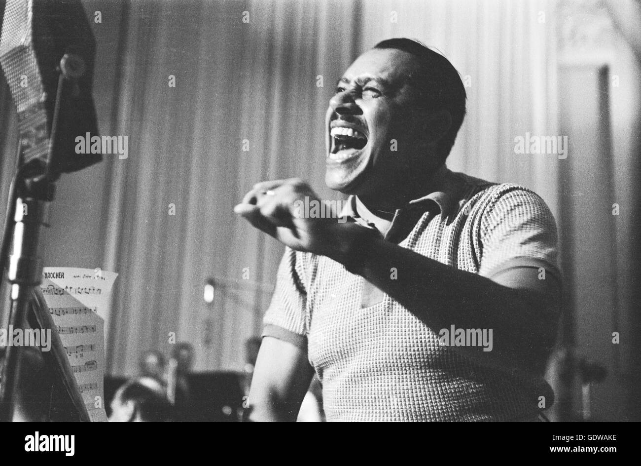 Cab Calloway in a recording studio Stock Photo - Alamy