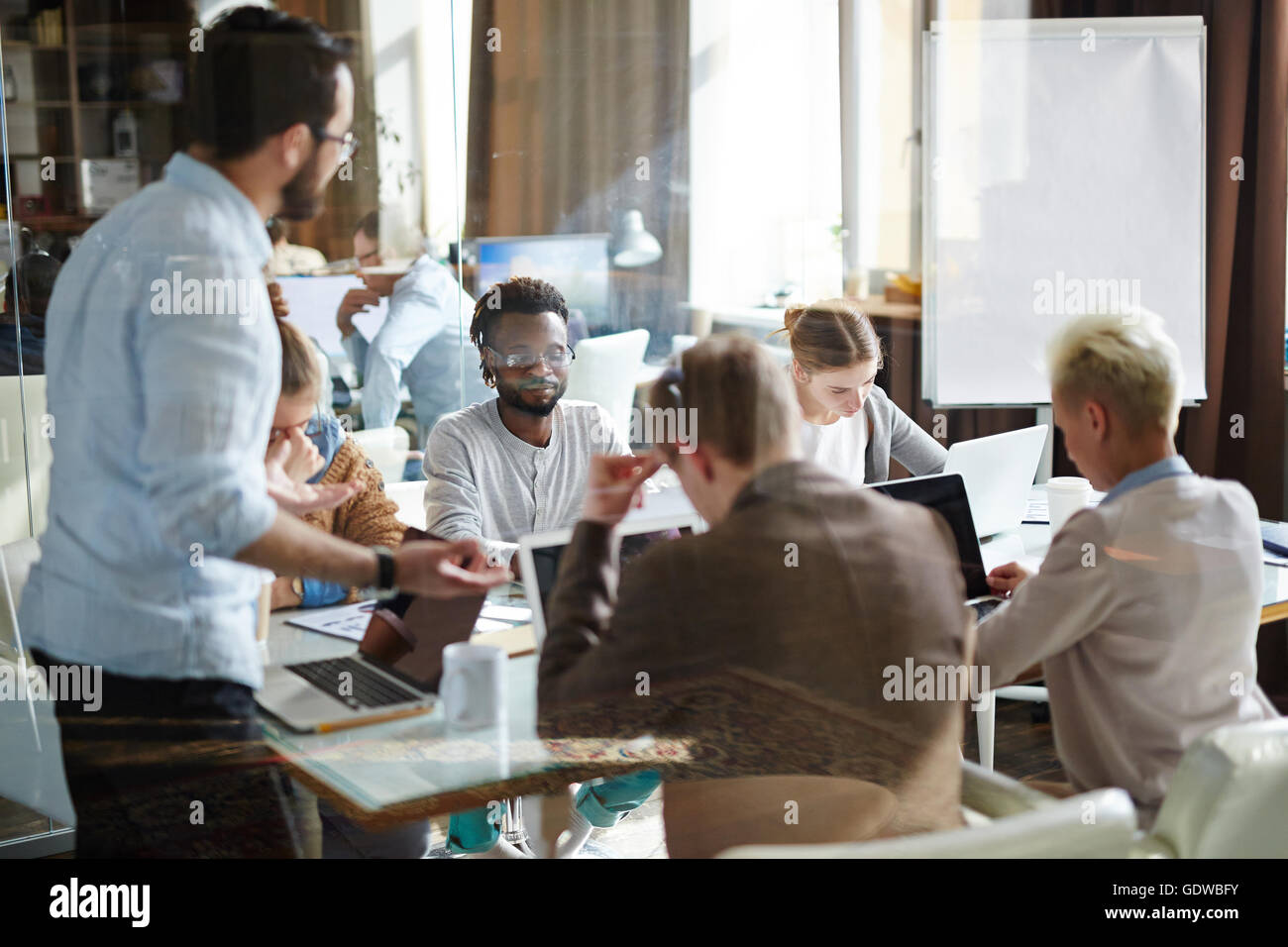 Discussing new project Stock Photo - Alamy