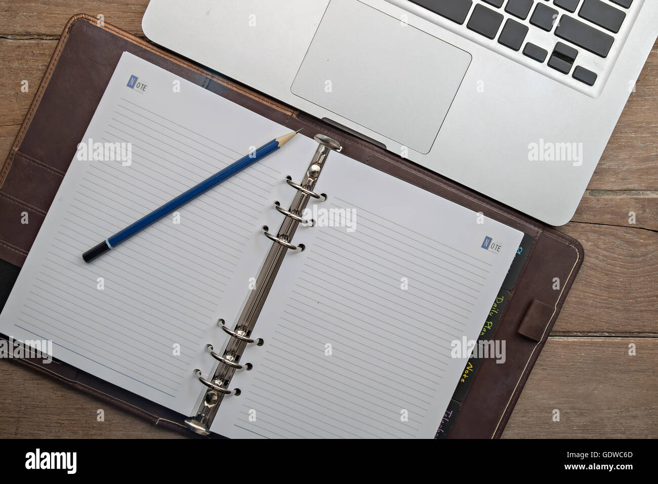Diary with Laptop Stock Photo - Alamy