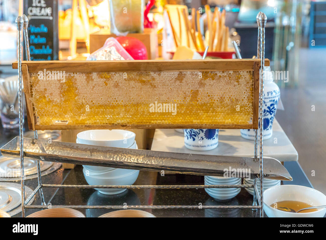 Raw Honey rack in restaurant Stock Photo - Alamy