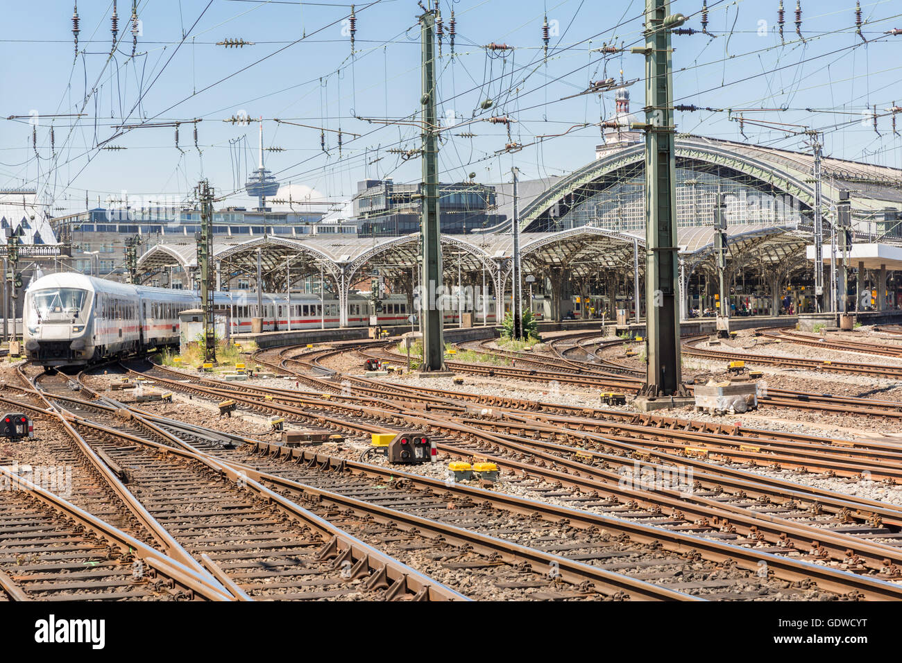 white train depart from the station Cologne Germany Stock Photo - Alamy