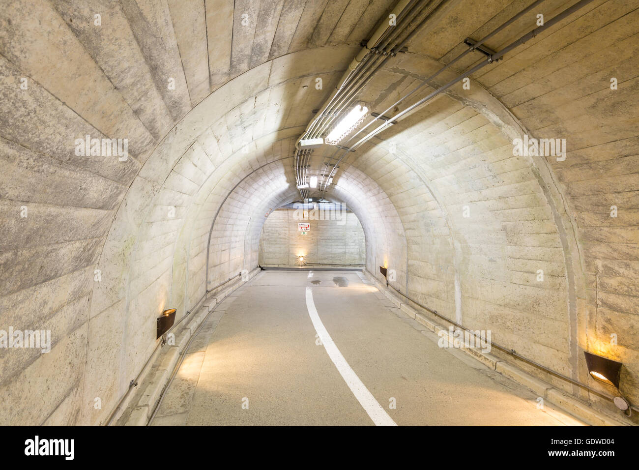 Interior of an urban walkway tunnel road Stock Photo - Alamy