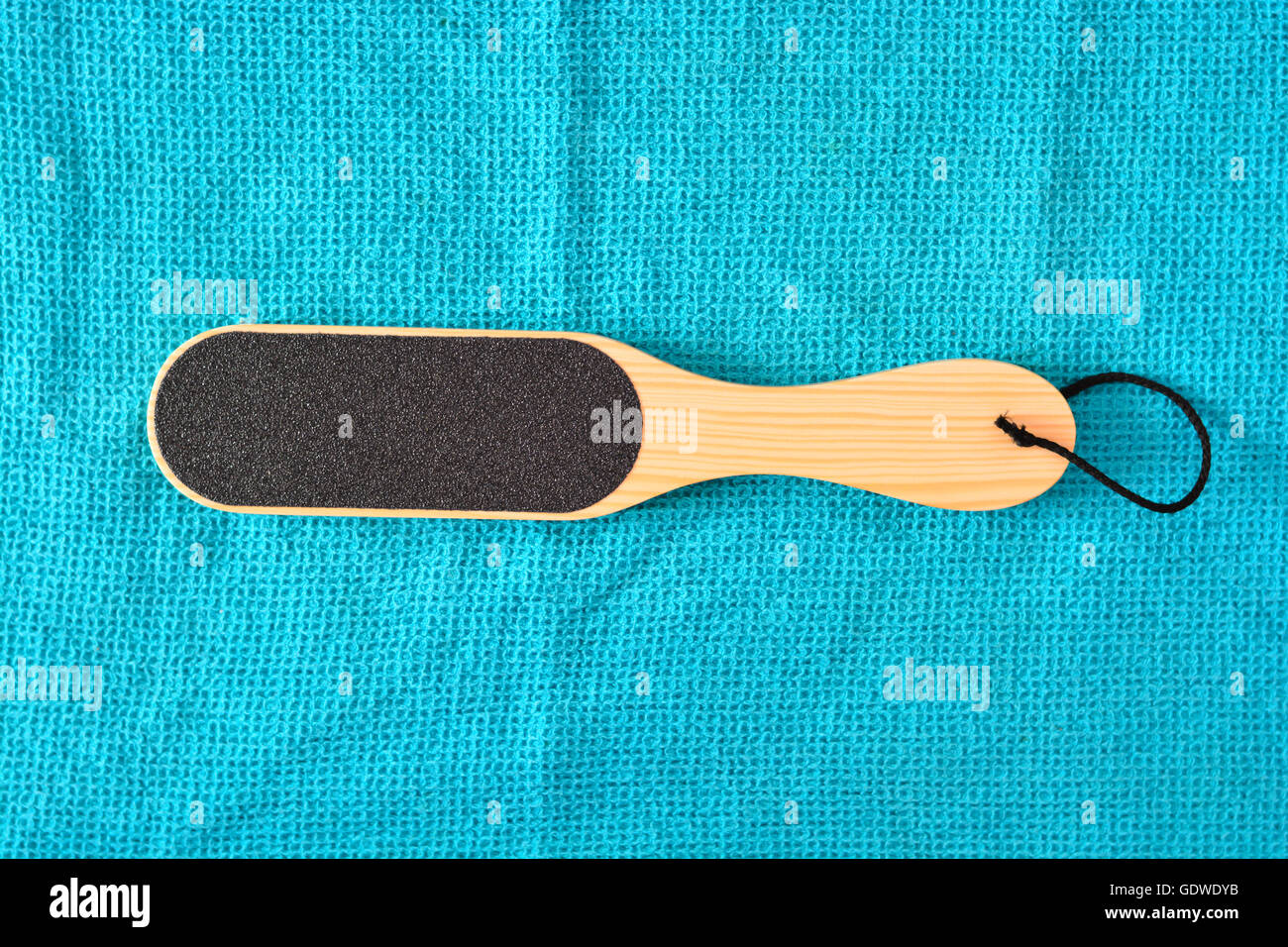 Foot file isolated on blue background Stock Photo - Alamy