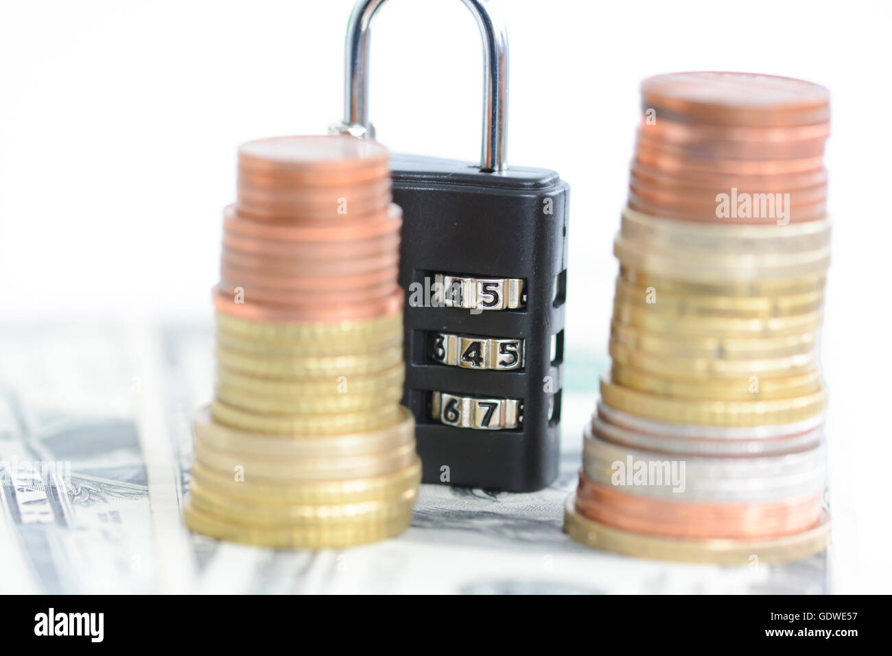 Secure your savings concept with cipher lock and money Stock Photo - Alamy