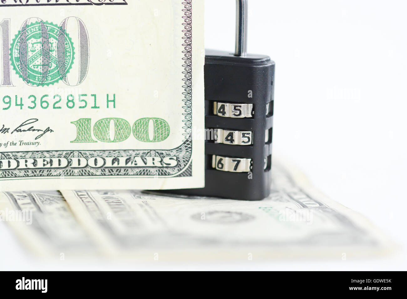 Secure your savings concept with cipher lock and money Stock Photo - Alamy