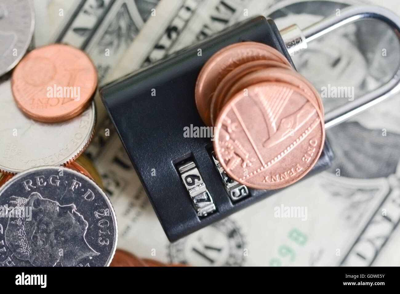 Secure your savings concept with cipher lock and money Stock Photo - Alamy