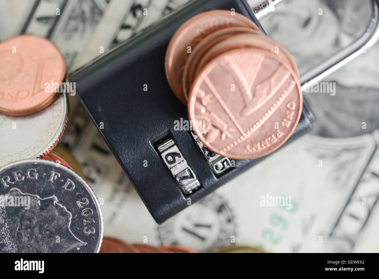 Secure your savings concept with cipher lock and money Stock Photo - Alamy