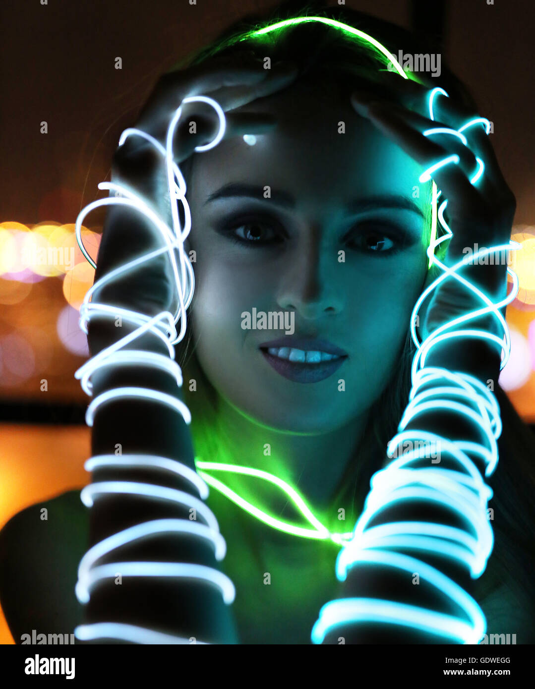 Girl with neon lights Stock Photo - Alamy