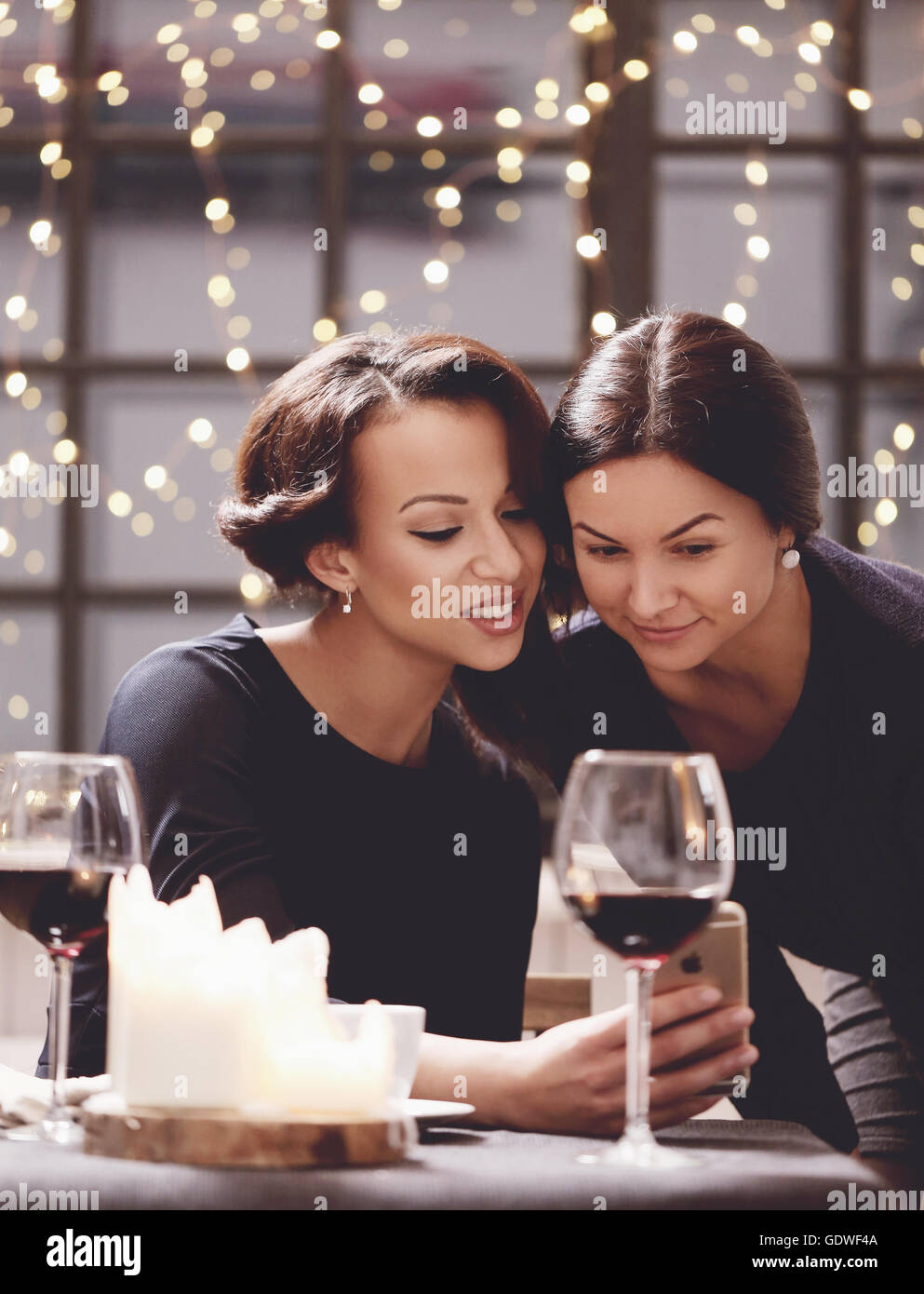 Women in restaurant Stock Photo - Alamy