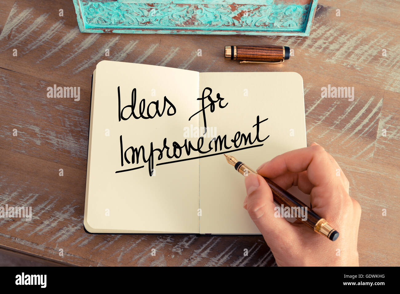 Handwritten text Ideas For Improvement as concept image Stock Photo - Alamy