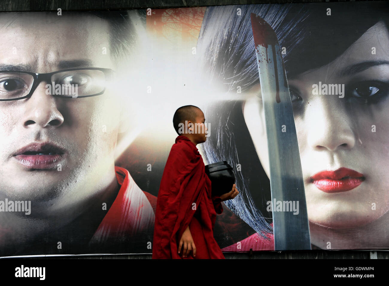 Monk and movie poster Stock Photo - Alamy