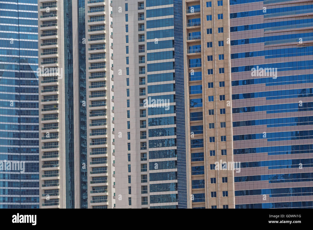 windows of several towers in Dubai Stock Photo - Alamy