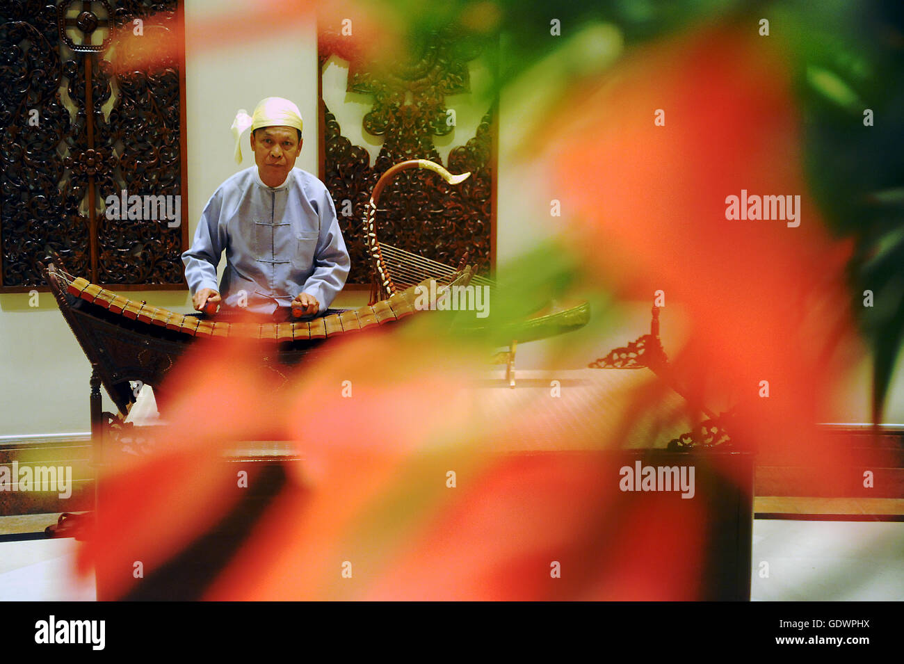 Portrait of musician in the burmese capital city of rangoon hi-res ...