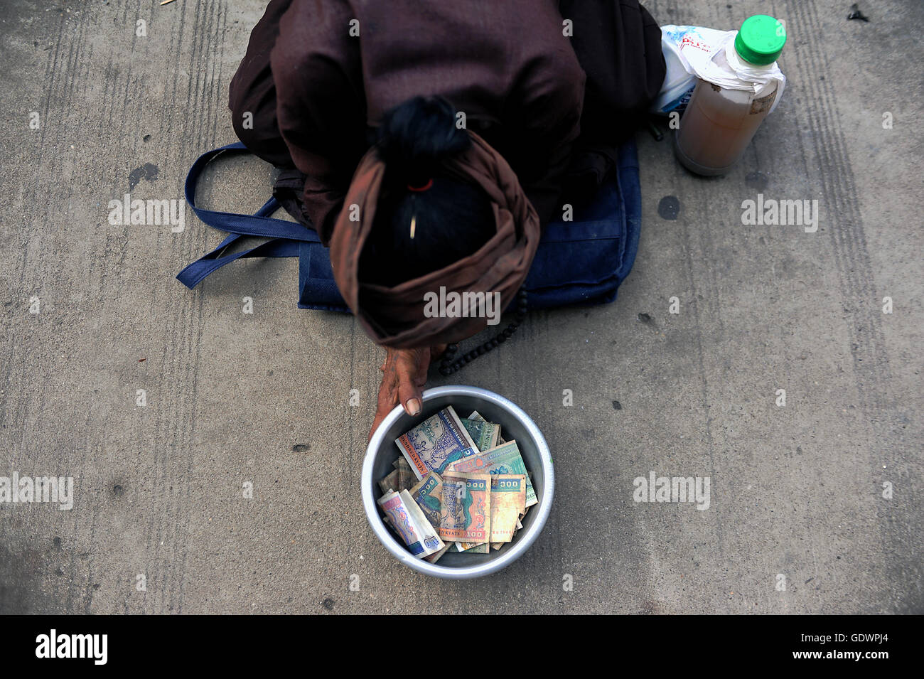 Old woman begging Stock Photo - Alamy