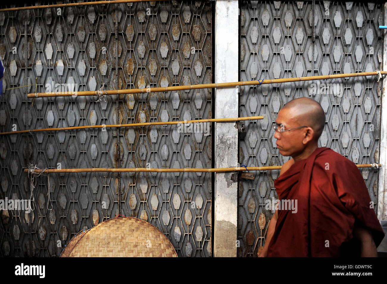Street scene with monk Stock Photo - Alamy