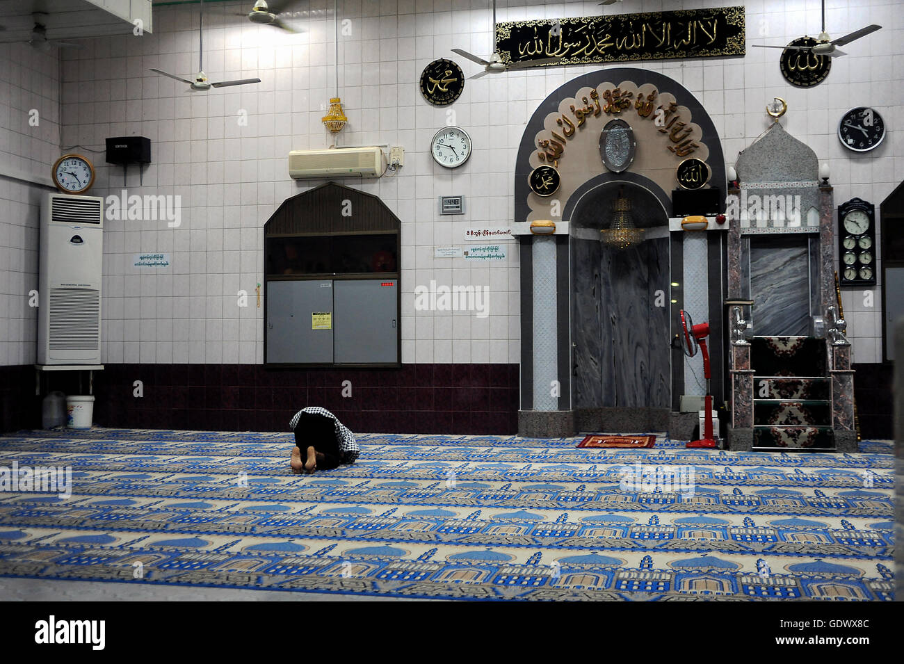 Man is praying inside a mosque Stock Photo - Alamy