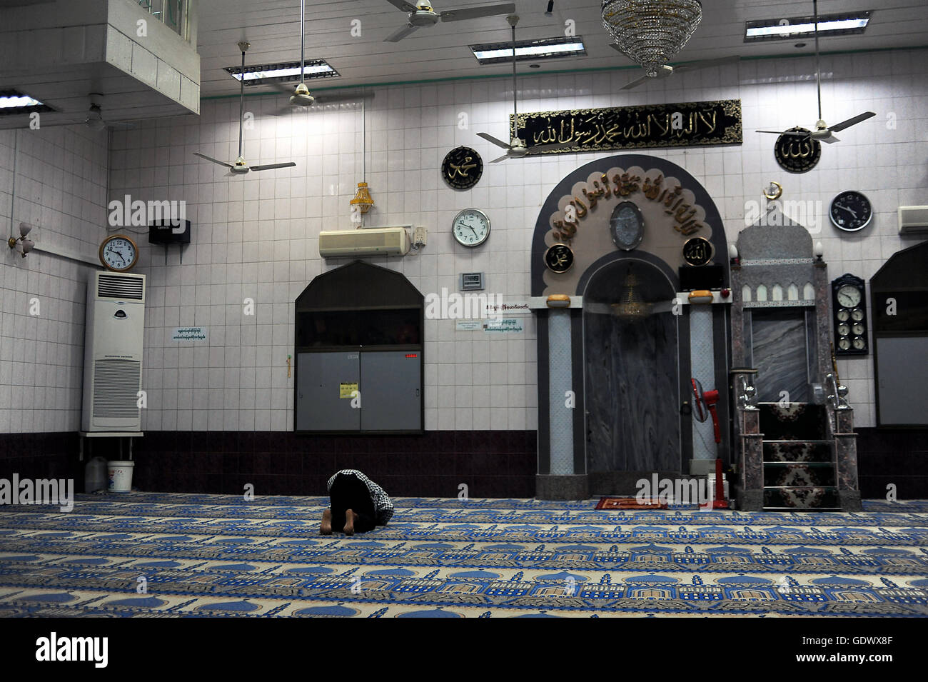 Man is praying inside a mosque Stock Photo - Alamy