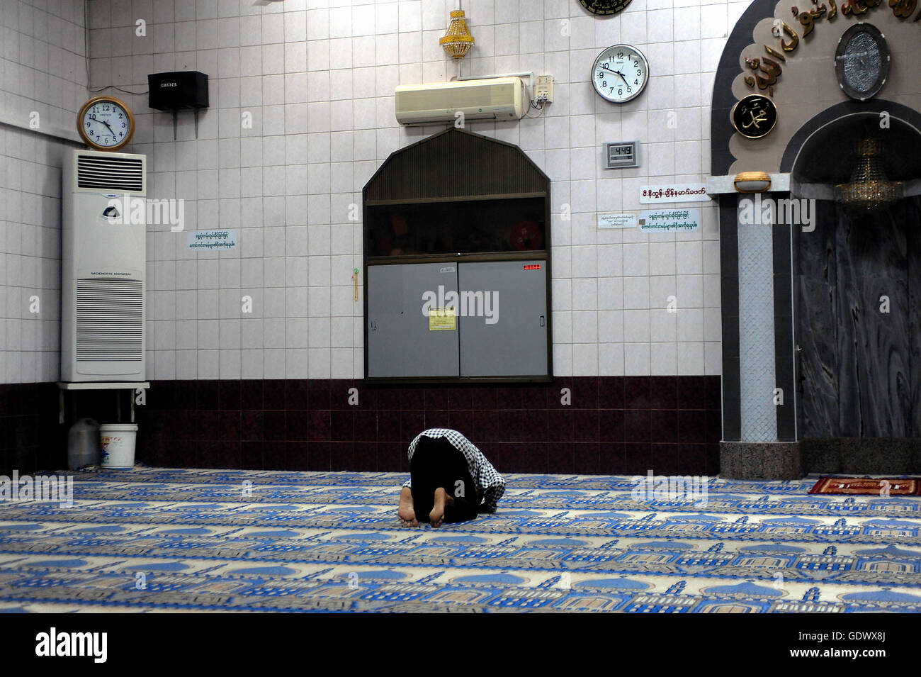 Man is praying inside a mosque Stock Photo - Alamy
