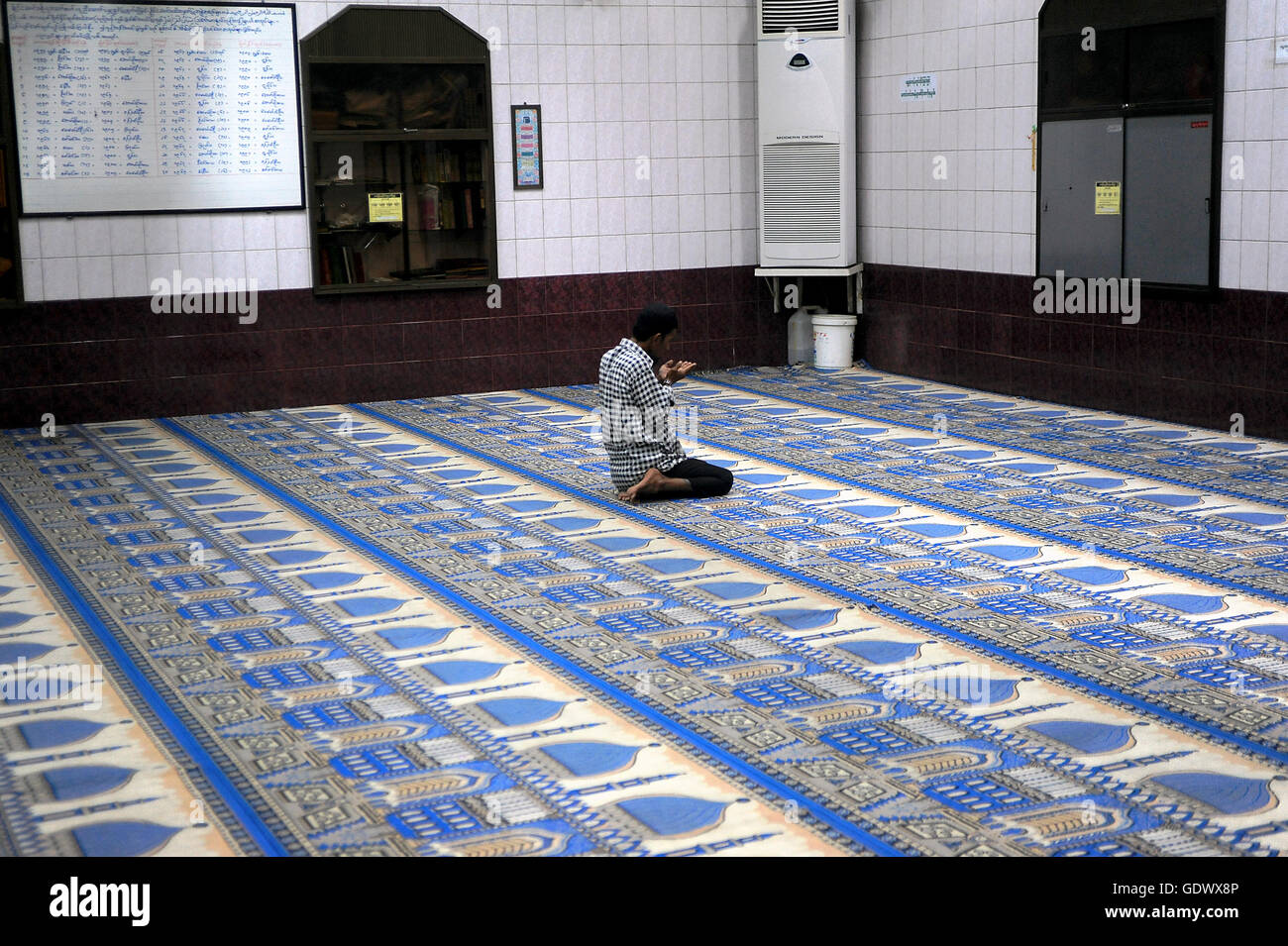Man is praying inside a mosque Stock Photo - Alamy