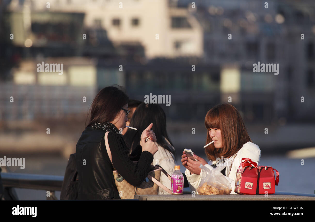 Two smoking cigarette hi-res stock photography and images - Alamy
