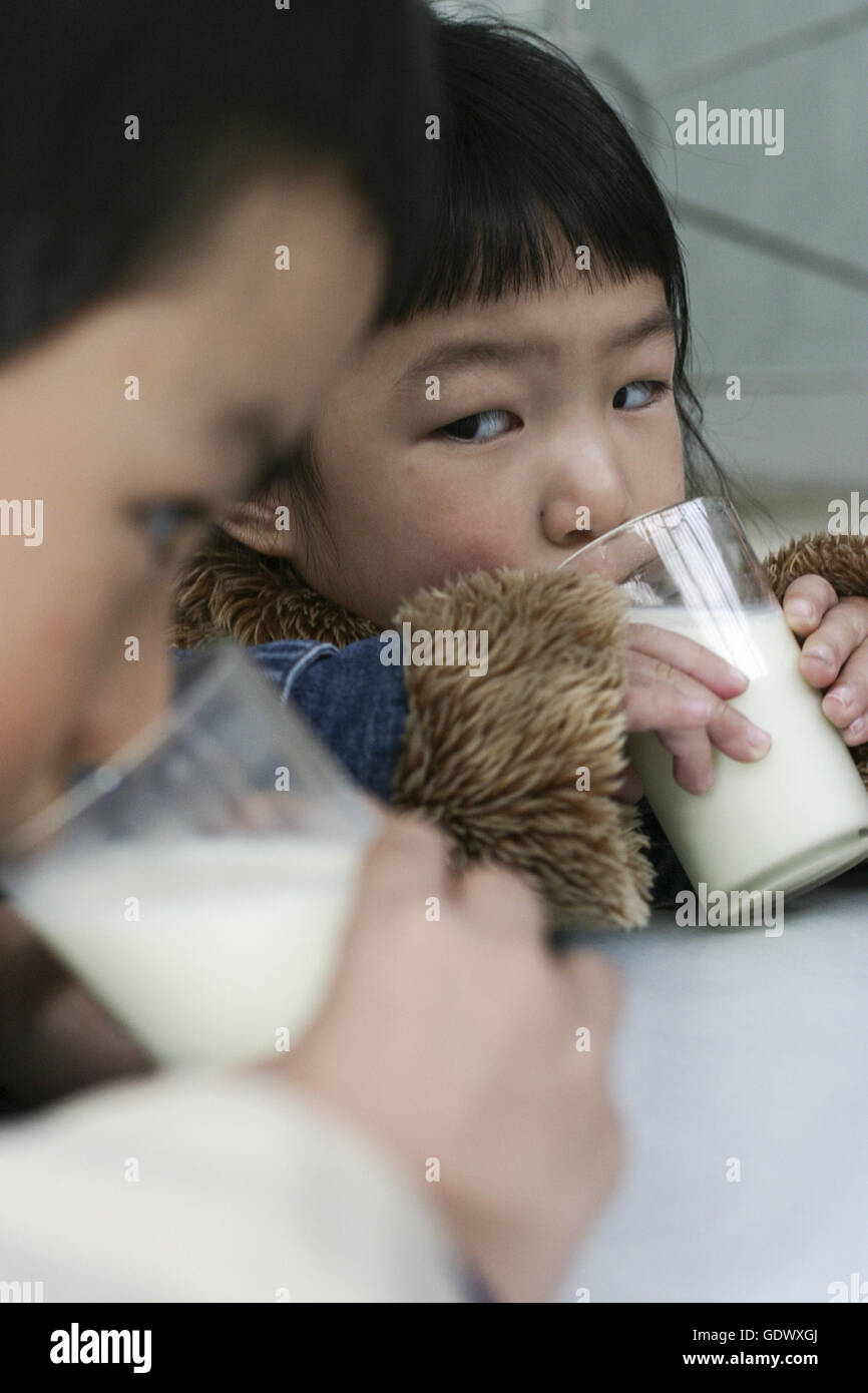 Children drink milk Stock Photo - Alamy