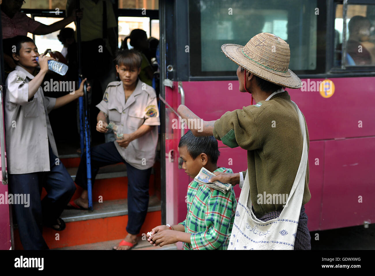 Begging father and son Stock Photo - Alamy