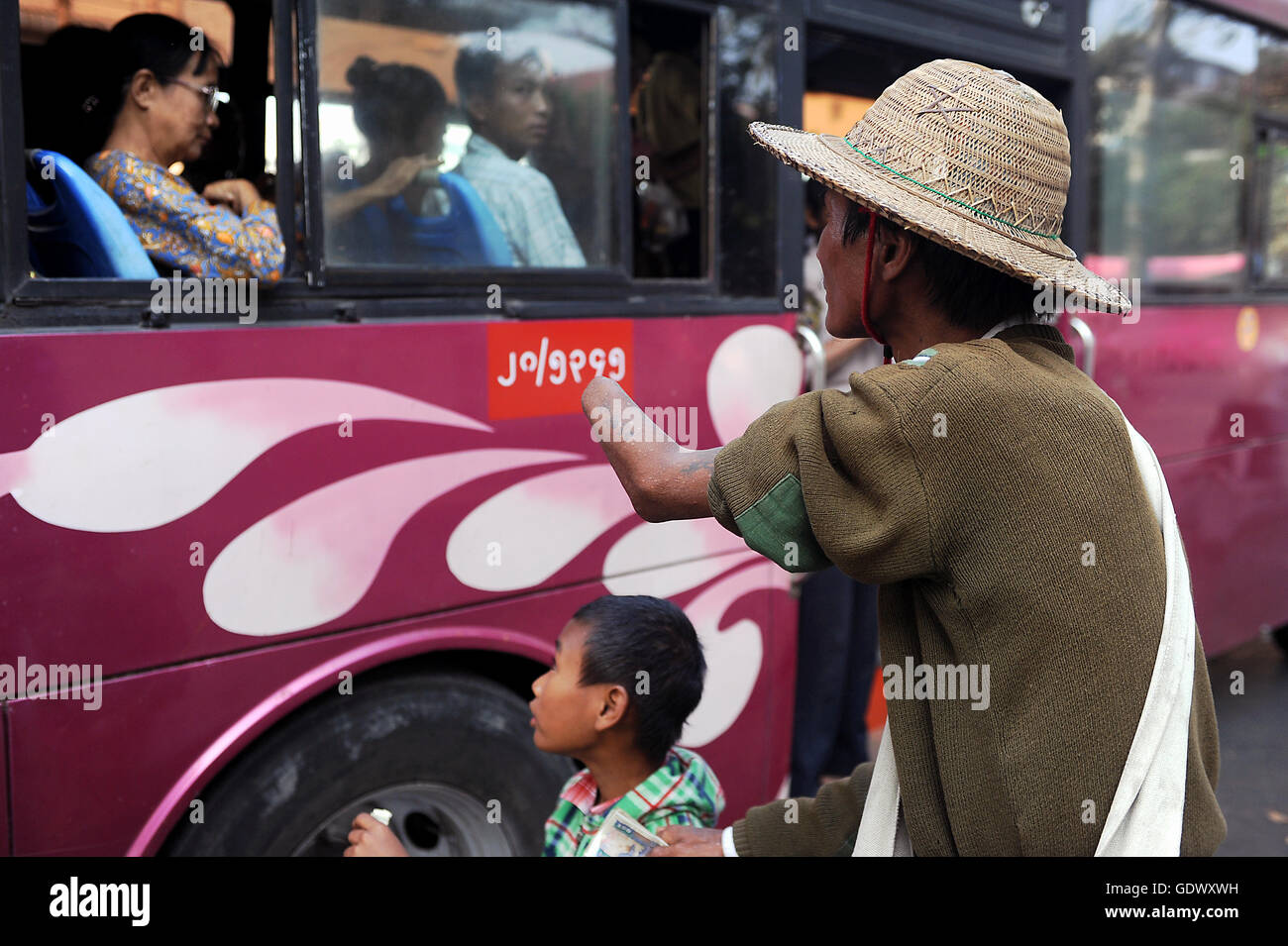 Begging father and son Stock Photo - Alamy