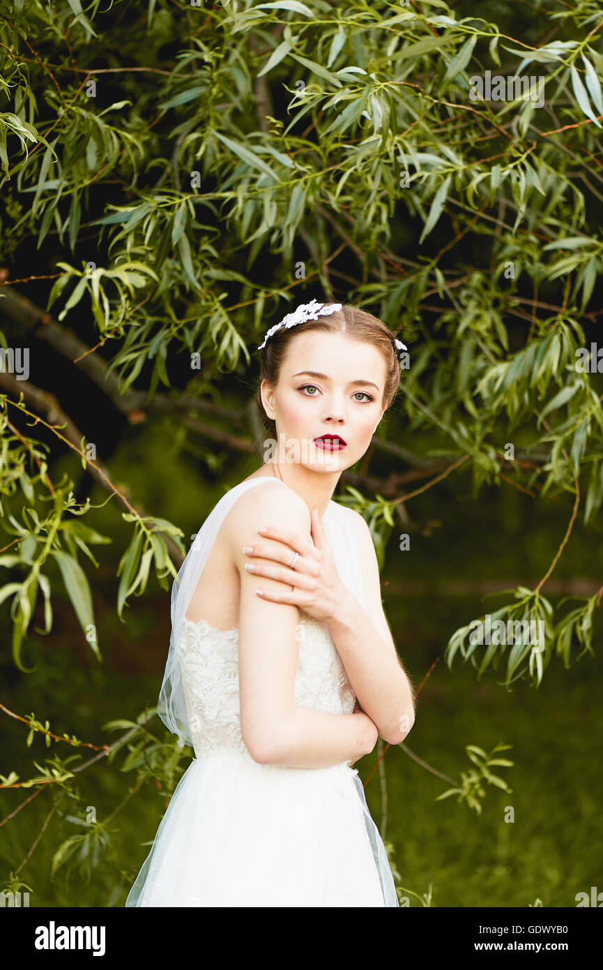 Young Woman With Arms Crossed Over Chest High Resolution Stock ...