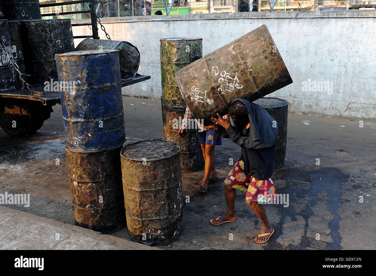Carrying heavy barrel hi-res stock photography and images - Alamy