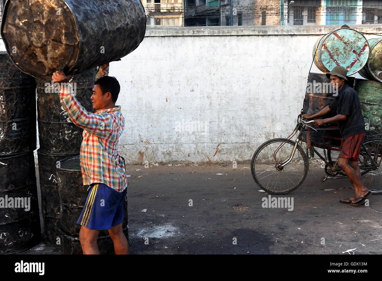 Carrying heavy barrel hi-res stock photography and images - Alamy