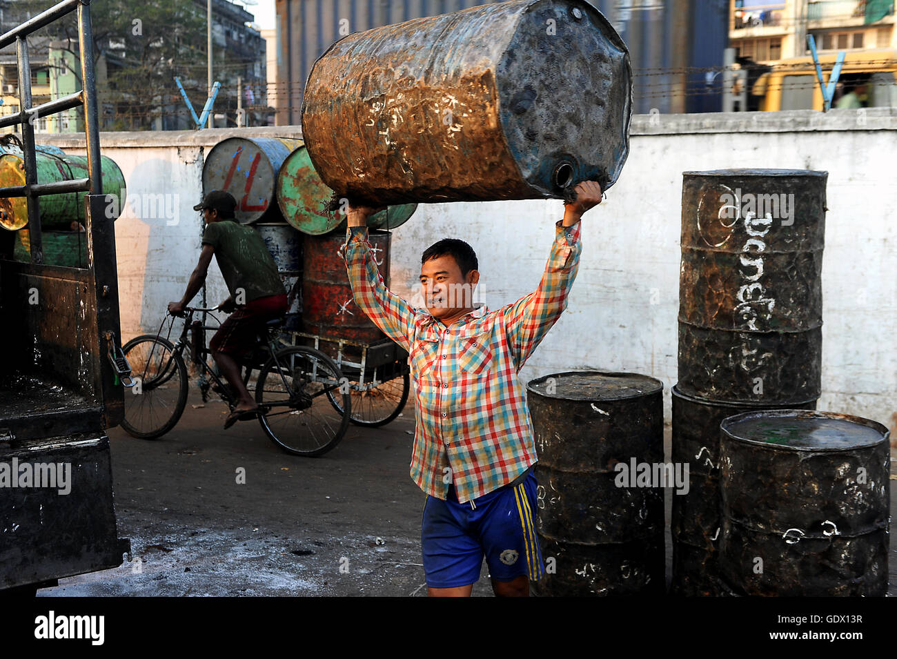 Carrying heavy barrel hi-res stock photography and images - Alamy