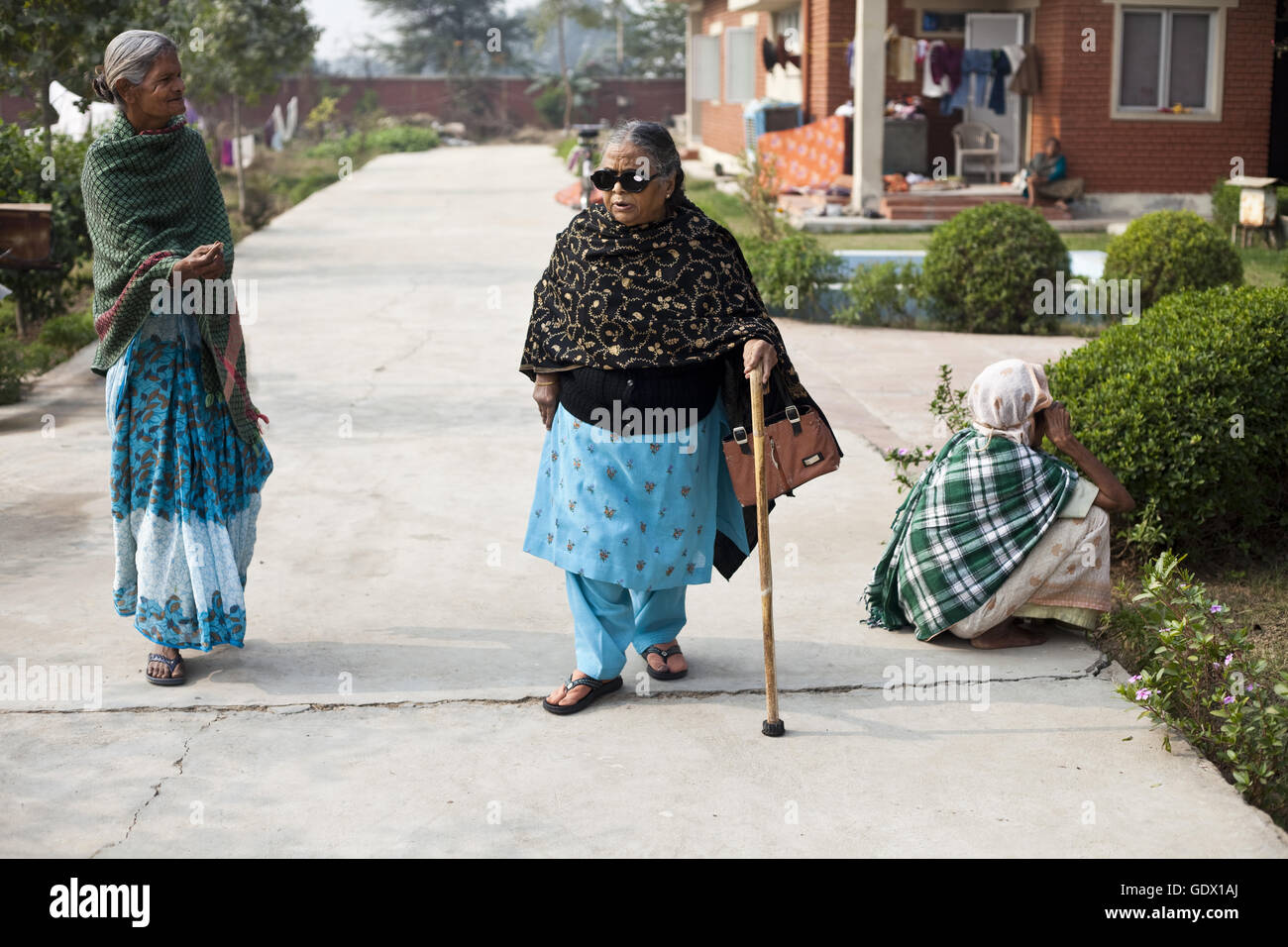 Two Indian women talking Stock Photo - Alamy
