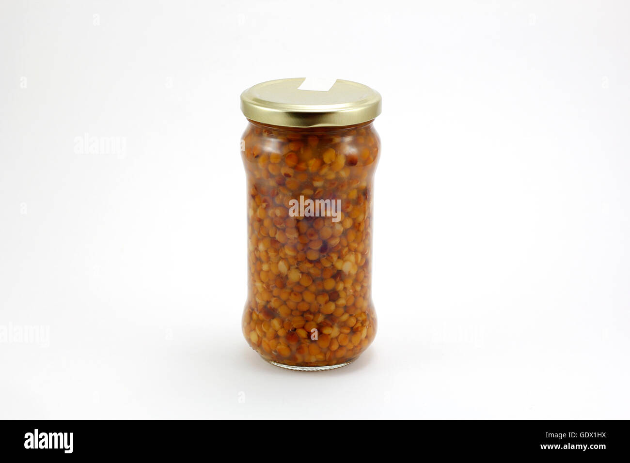 Canned lentils in a glass jar, isolated in a white background Stock ...