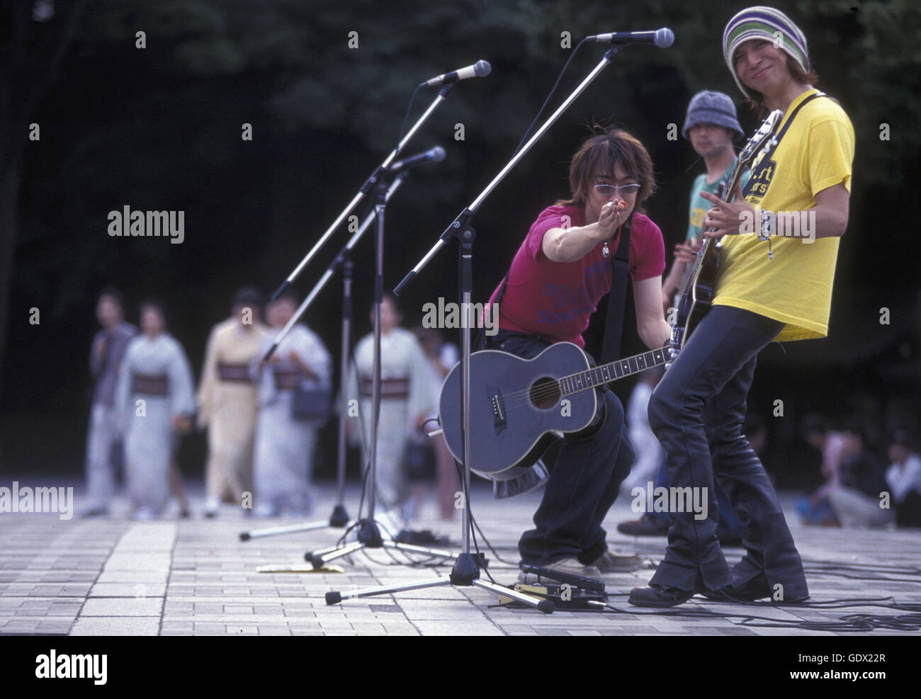 a Japanese Youth Punk Band plays on a square in the City of Tokyo in ...