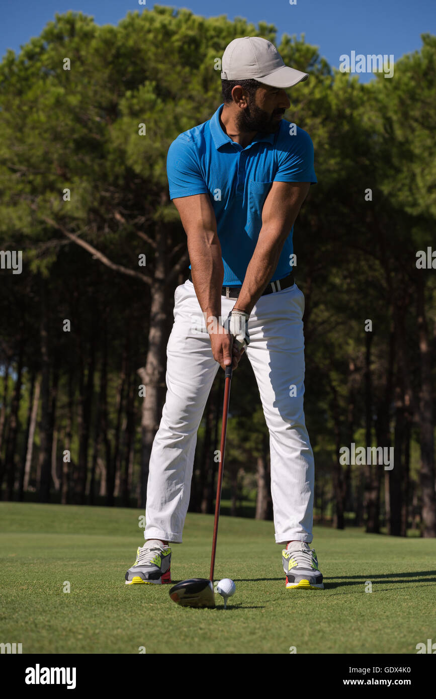 golf player hitting shot with club on course at beautiful morning Stock ...