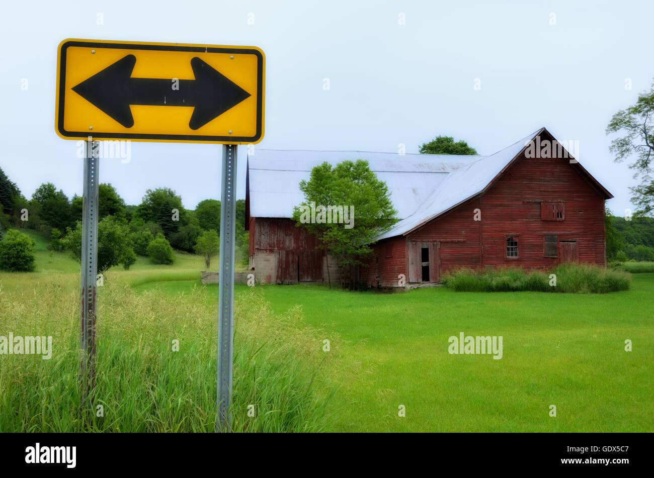 Country Barn with Road Sign Stock Photo - Alamy