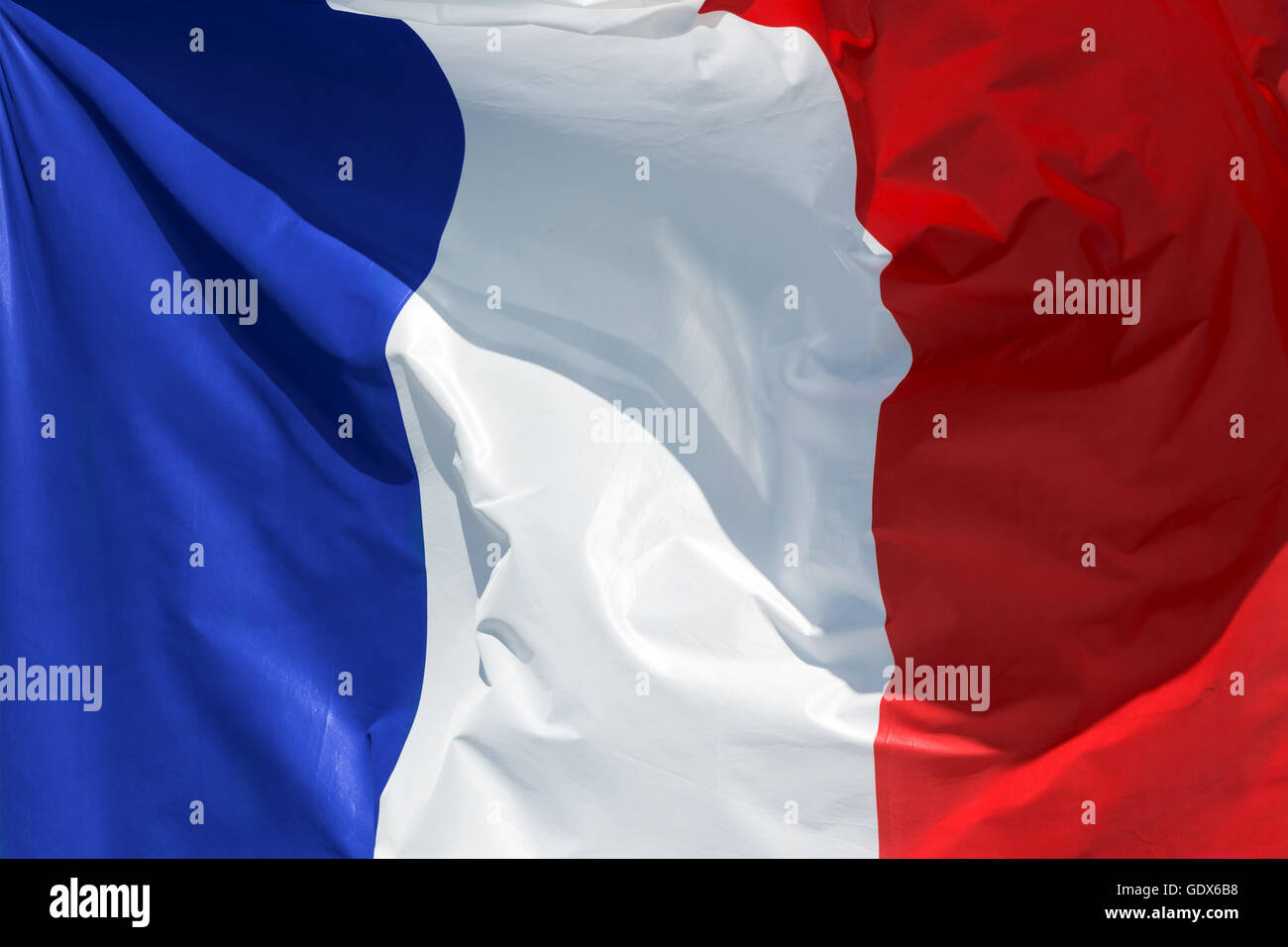 full framed french flag floating in the wind exact colors Stock Photo ...