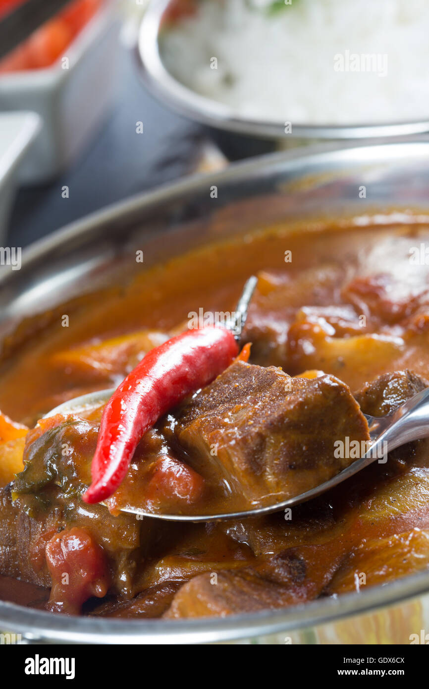 A close-up view of Malaysian beef Rendang curry, (Rendang Daging Stock ...