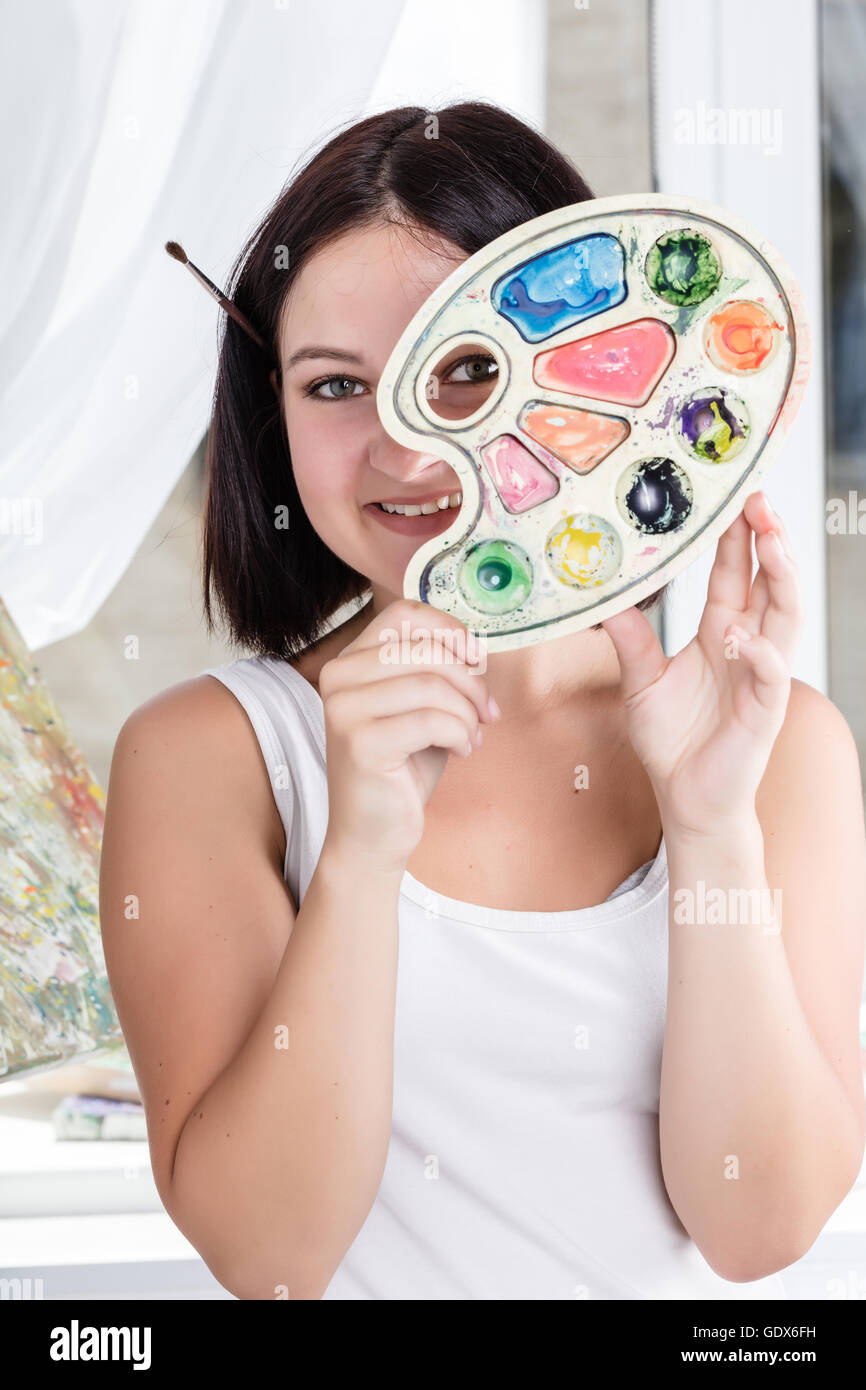 portrait of a teenager with colorful palette in hand Stock Photo - Alamy