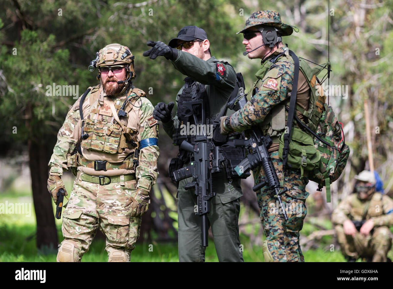 menss in military uniform with weapon on a mission Stock Photo - Alamy