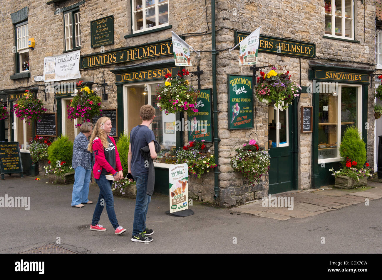 People looking in the window of Hunters of Helmsley - independent ...