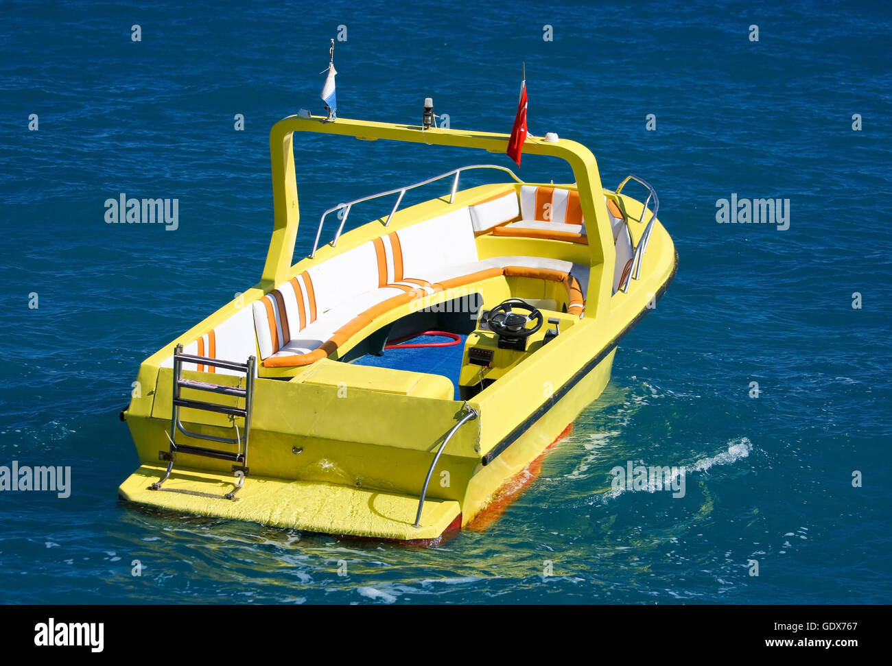 Yellow motorboat, empty without people Stock Photo - Alamy