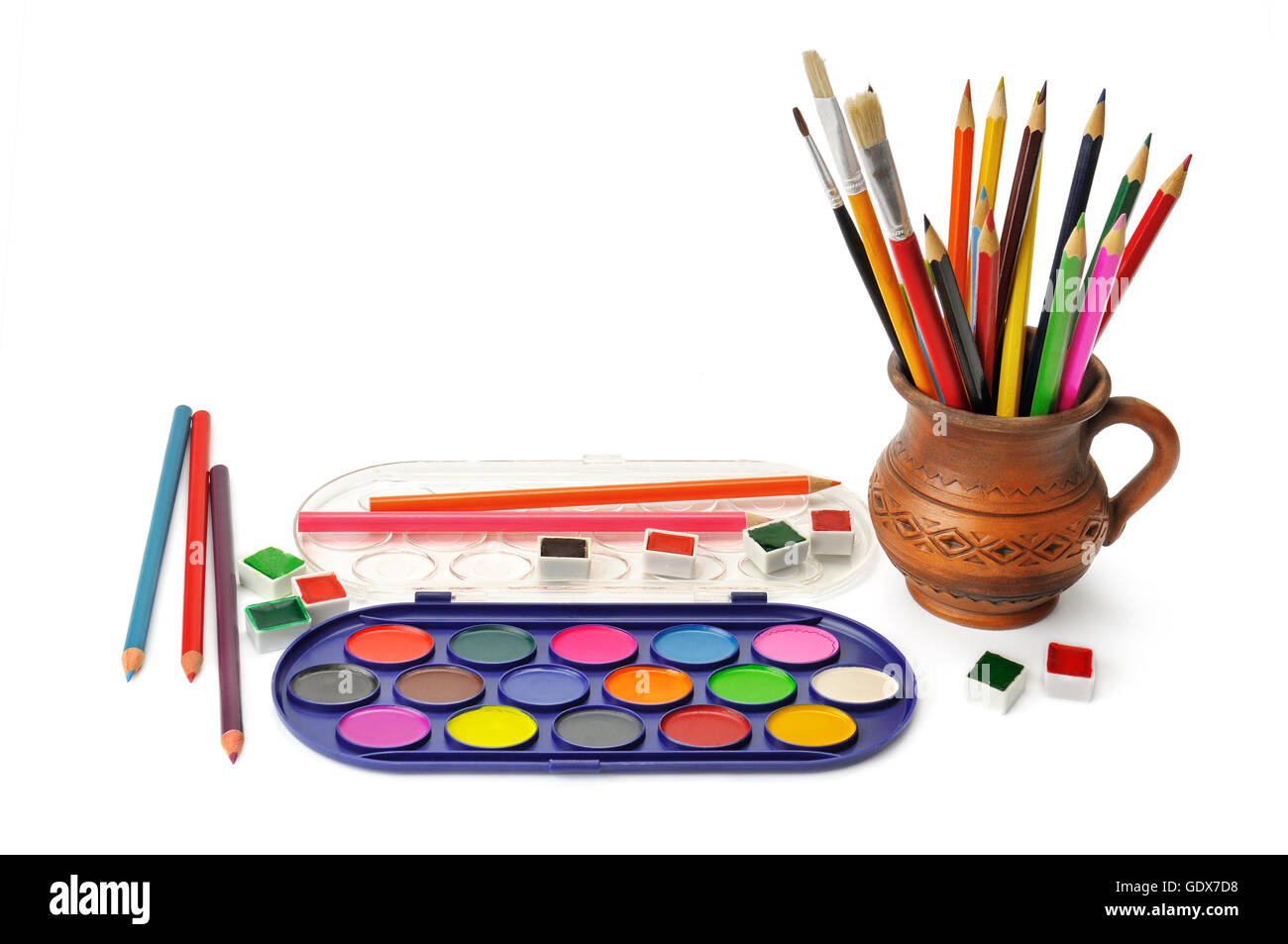 watercolor paint and colored pencils isolated on white background Stock ...