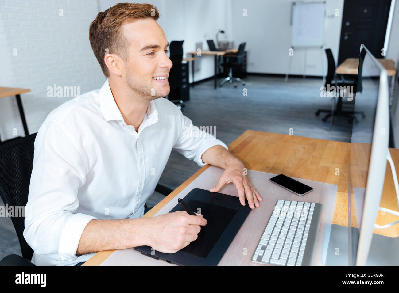 Young caucasian male artist working hi-res stock photography and images ...