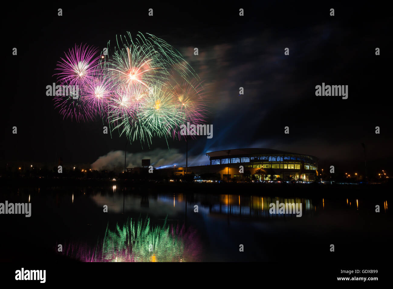 Firework over Stadium in nighttime Stock Photo - Alamy