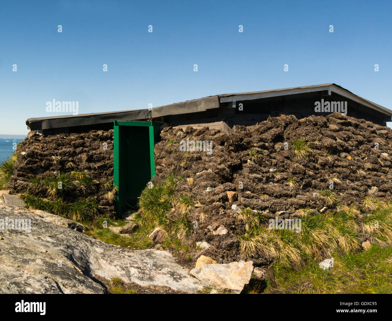 Turf peat house used by Inuits as winter home Ilulissat is a town in ...