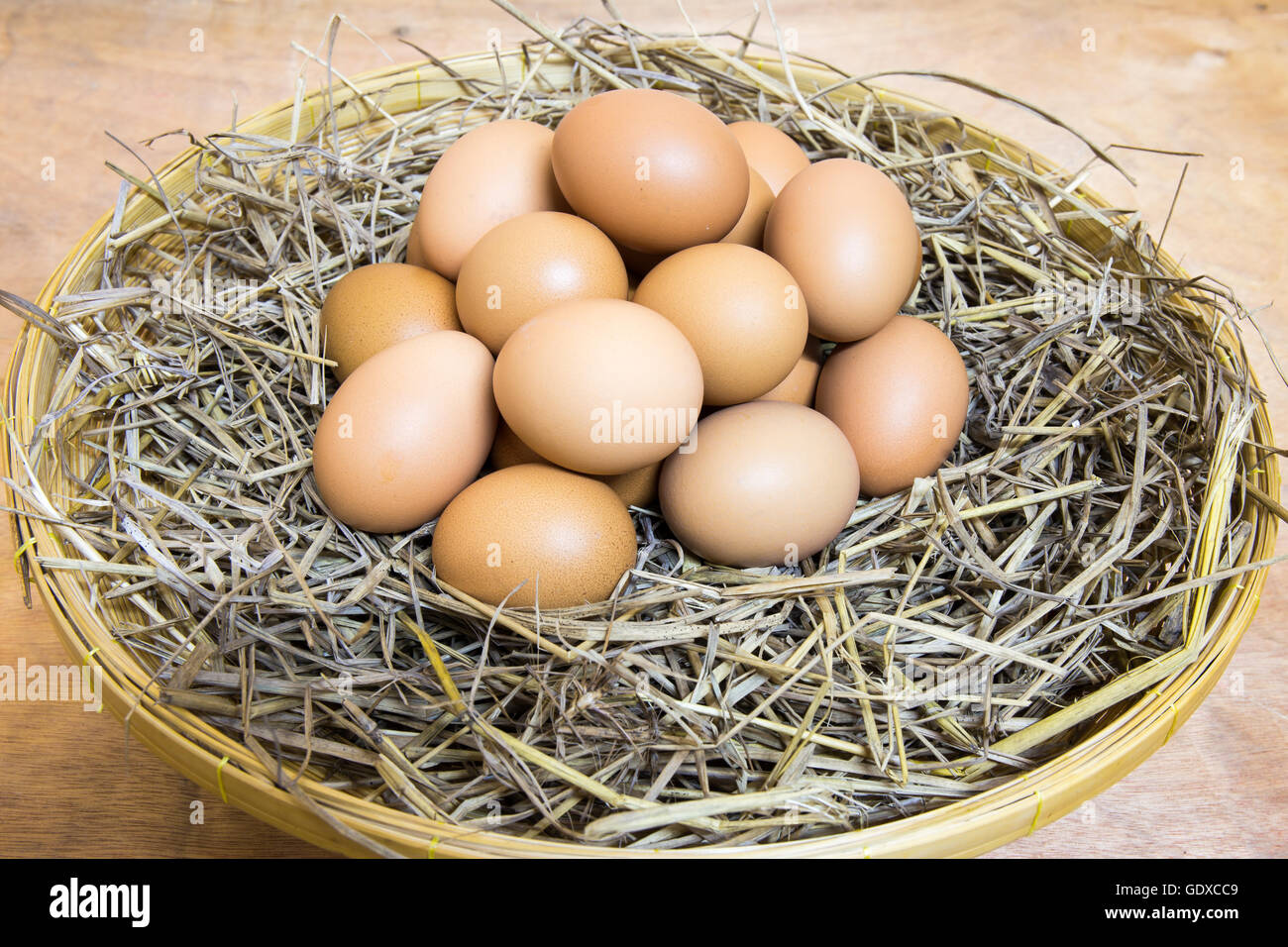 eggs group in basket thatch Stock Photo - Alamy