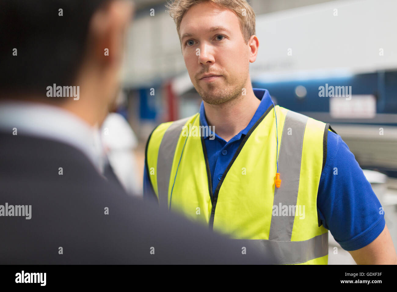 Supervisor talking in steel factory hi-res stock photography and images ...